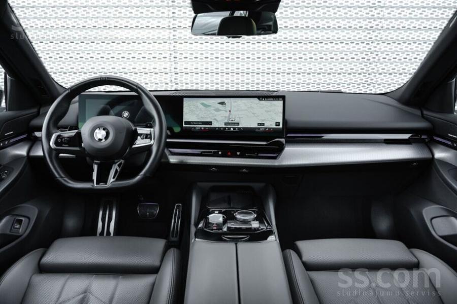 Black BMW 520 2024 in Riga, with an engine capacity of 2.00 L and mileage of 67 thousand km for 52650 €, photo 8 on AUTOMOTO.COM.LV