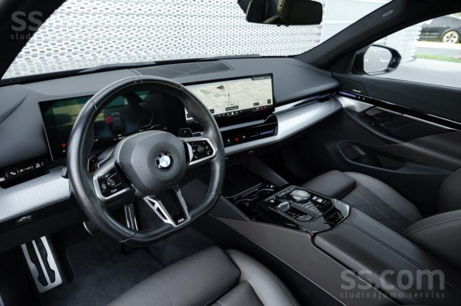 Black BMW 520 2024 in Riga, with an engine capacity of 2.00 L and mileage of 67 thousand km for 52650 €, photo 12 on AUTOMOTO.COM.LV