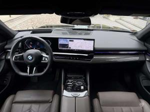 Black BMW 520 2025 in Vilnius, with an engine capacity of 2.00 L and mileage of 24 thousand km for 53900 €, photo 7 on AUTOMOTO.COM.LV