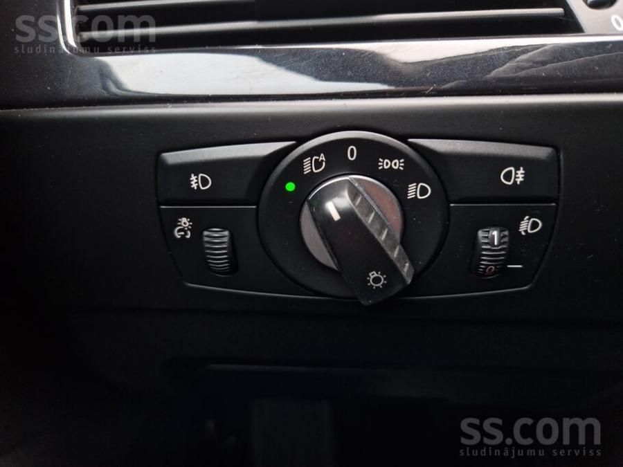 Black BMW 520 2008 in Liepaja, with an engine capacity of 2.00 L and mileage of 304 thousand km for 4690 €, photo 23 on AUTOMOTO.COM.LV