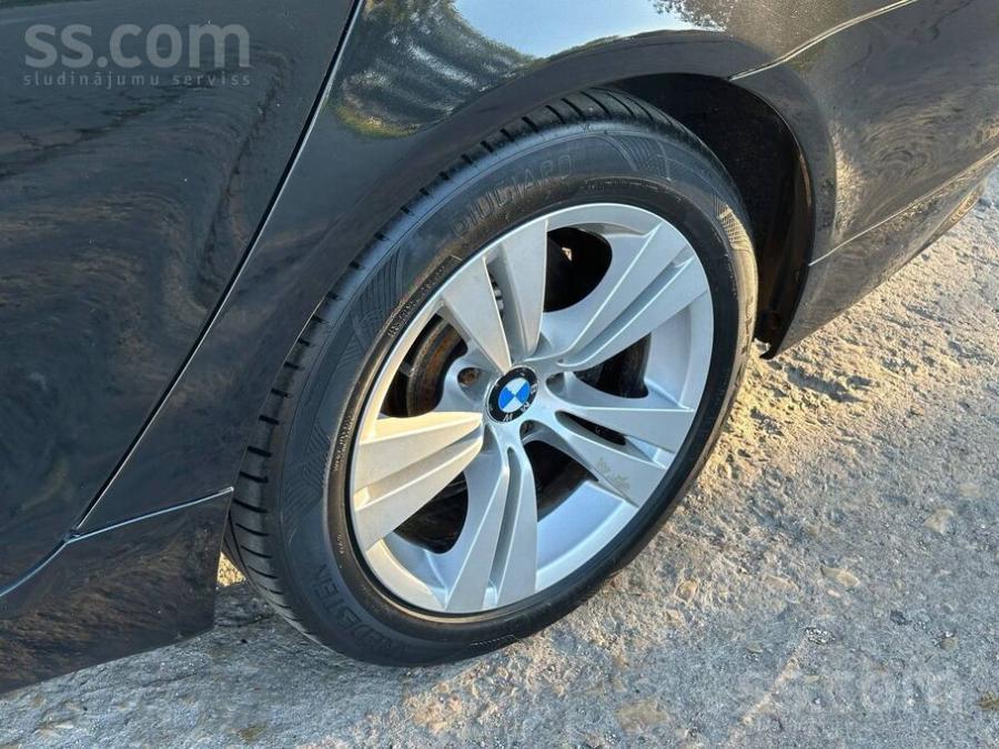 Black BMW 520 2009 in Riga, with an engine capacity of 2.00 L and mileage of 0 thousand km for 3950 €, photo 14 on AUTOMOTO.COM.LV