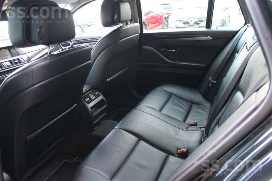 Black BMW 520 2010 in Riga, with an engine capacity of 2.00 L and mileage of 0 thousand km for 6650 €, photo 16 on AUTOMOTO.COM.LV