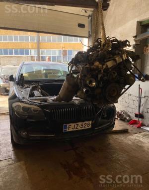 Black BMW 520 2011 in Riga, with an engine capacity of 2.00 L and mileage of 238 thousand km for 7000 €, photo 15 on AUTOMOTO.COM.LV