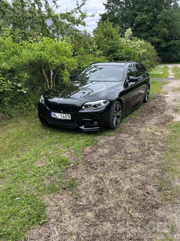 Black BMW 520 2011 in Riga, with an engine capacity of 2.00 L and mileage of 285 thousand km for 11500 €, photo 4 on AUTOMOTO.COM.LV