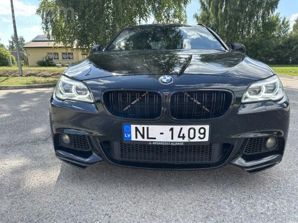 Black BMW 520 2011 in Riga, with an engine capacity of 2.00 L and mileage of 0 thousand km for 11500 €, photo 4 on AUTOMOTO.COM.LV