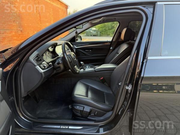 Black BMW 520 2011 in Cesis, with an engine capacity of 2.00 L and mileage of 280 thousand km for 8250 €, photo 8 on AUTOMOTO.COM.LV