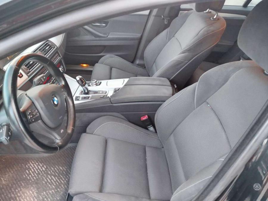 Black BMW 520 2011 in Kaunas, with an engine capacity of 2.00 L and mileage of 341 thousand km for 7999 €, photo 11 on AUTOMOTO.COM.LV