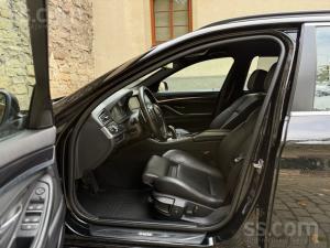 Black BMW 520 2011 in Cesis, with an engine capacity of 2.00 L and mileage of 280 thousand km for 8450 €, photo 9 on AUTOMOTO.COM.LV