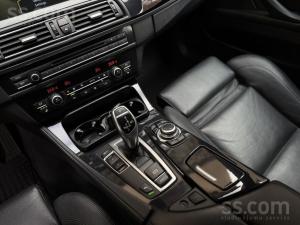 Black BMW 520 2011 in Cesis, with an engine capacity of 2.00 L and mileage of 280 thousand km for 8450 €, photo 14 on AUTOMOTO.COM.LV