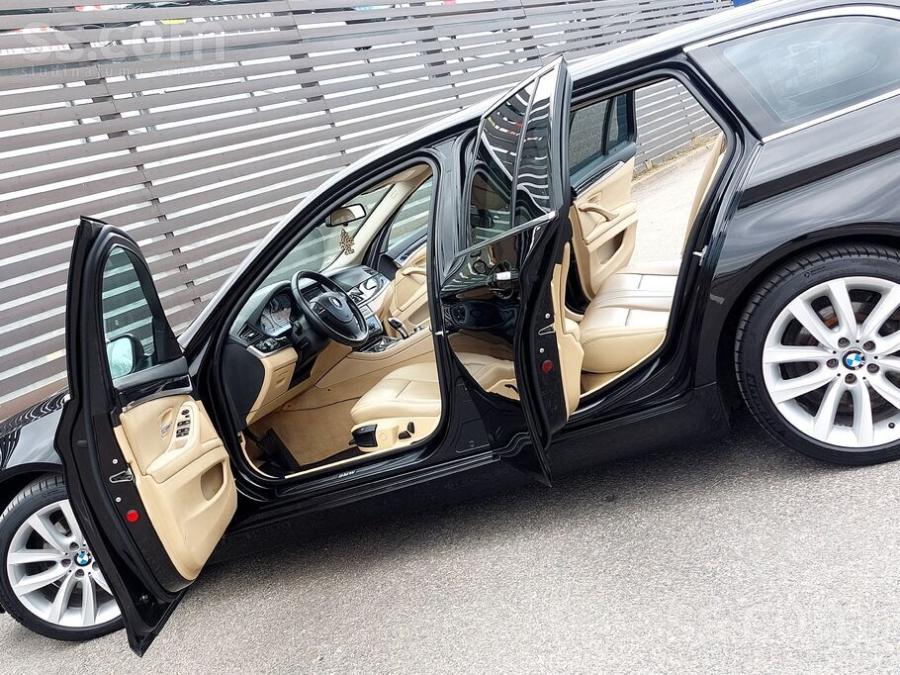 Black BMW 520 2012 in Riga, with an engine capacity of 2.00 L and mileage of 262 thousand km for 9900 €, photo 33 on AUTOMOTO.COM.LV