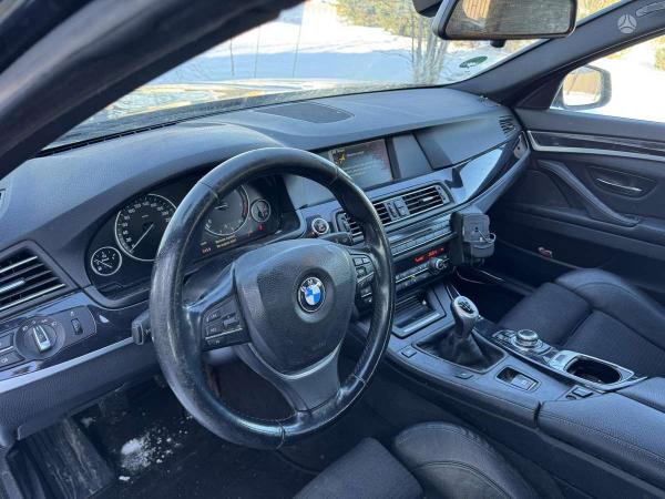 Black BMW 520 2012 in Marijampole, with an engine capacity of 2.00 L and mileage of 300 thousand km for 5199 €, photo 8 on AUTOMOTO.COM.LV