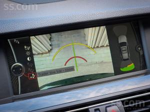 Black BMW 520 2012 in Riga, with an engine capacity of 2.00 L and mileage of 359 thousand km for 9700 €, photo 20 on AUTOMOTO.COM.LV