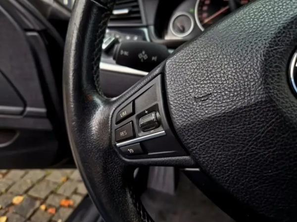 Black BMW 520 2012 in Riga, with an engine capacity of 2.00 L and mileage of 275 thousand km for 8990 €, photo 10 on AUTOMOTO.COM.LV