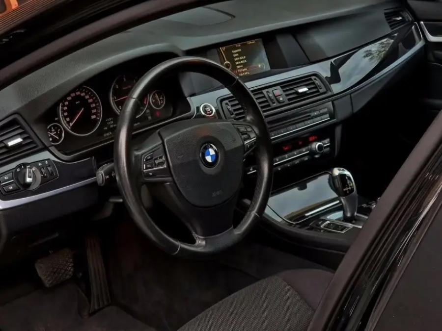 Black BMW 520 2012 in Riga, with an engine capacity of 2.00 L and mileage of 275 thousand km for 8990 €, photo 21 on AUTOMOTO.COM.LV
