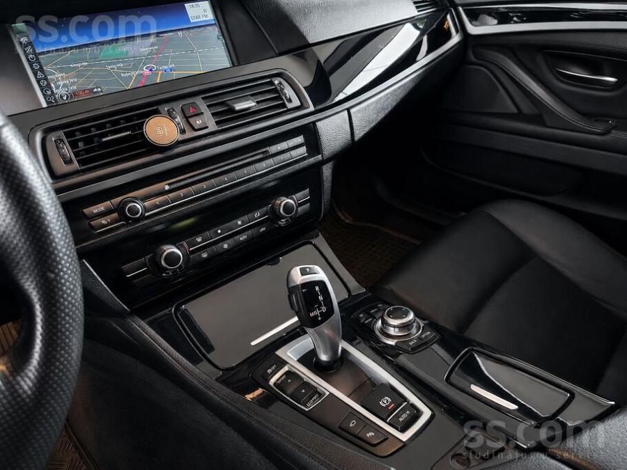 Black BMW 520 2012 in Riga, with an engine capacity of 2.00 L and mileage of 293 thousand km for 7900 €, photo 7 on AUTOMOTO.COM.LV