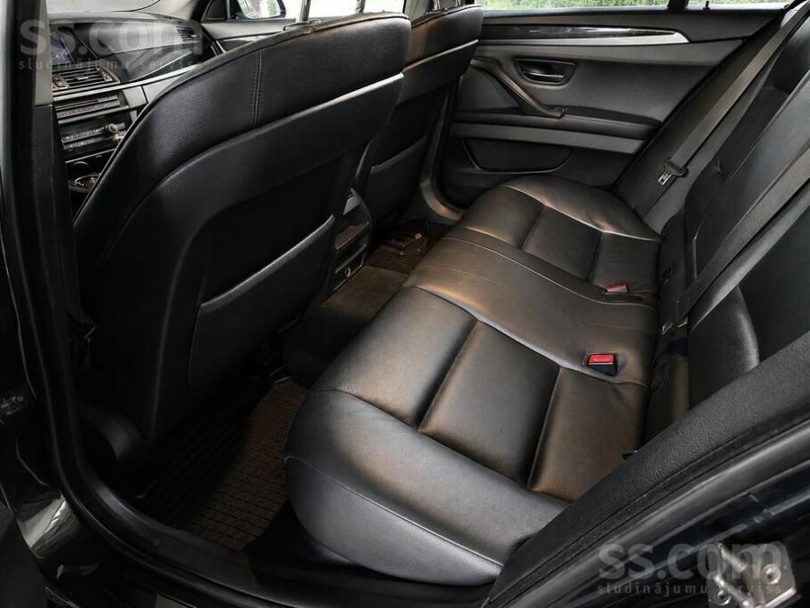 Black BMW 520 2012 in Riga, with an engine capacity of 2.00 L and mileage of 293 thousand km for 7900 €, photo 8 on AUTOMOTO.COM.LV