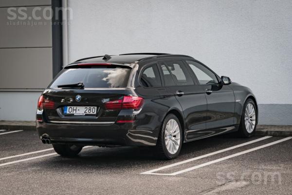 Black BMW 520 2013 in Riga, with an engine capacity of 2.00 L and mileage of 215 thousand km for 10750 €, photo 4 on AUTOMOTO.COM.LV