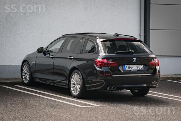 Black BMW 520 2013 in Riga, with an engine capacity of 2.00 L and mileage of 215 thousand km for 10750 €, photo 6 on AUTOMOTO.COM.LV