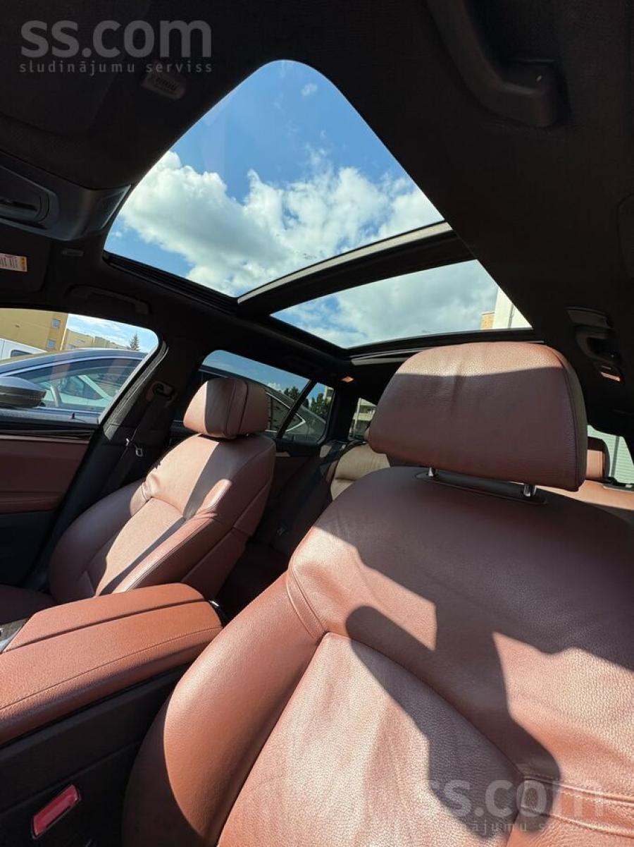 Black BMW 520 2013 in Riga, with an engine capacity of 2.00 L and mileage of 299 thousand km for 10250 €, photo 7 on AUTOMOTO.COM.LV