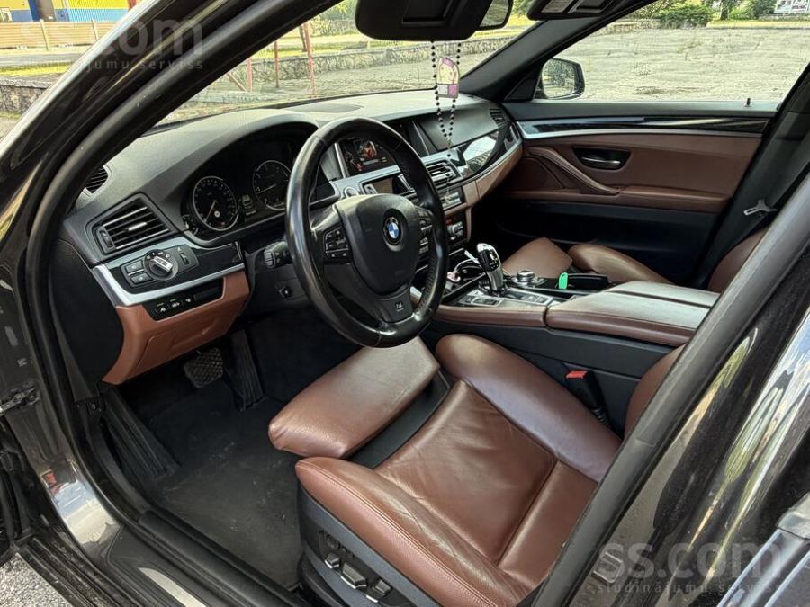 Black BMW 520 2013 in Riga, with an engine capacity of 2.00 L and mileage of 224 thousand km for 9400 €, photo 8 on AUTOMOTO.COM.LV