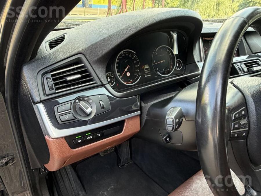 Black BMW 520 2013 in Riga, with an engine capacity of 2.00 L and mileage of 224 thousand km for 9400 €, photo 9 on AUTOMOTO.COM.LV