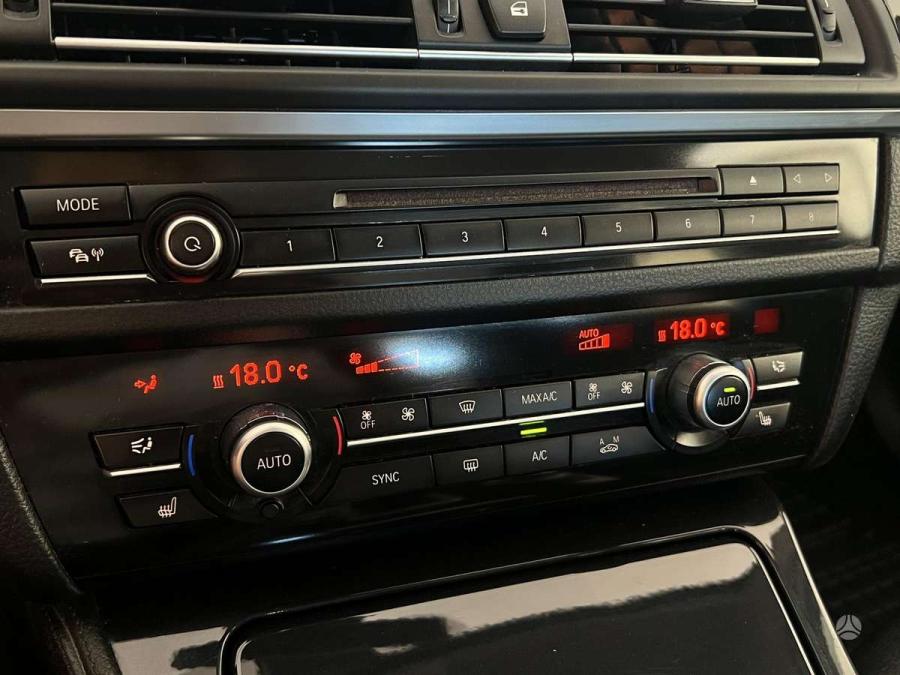 Black BMW 520 2013 in Kaunas, with an engine capacity of 2.00 L and mileage of 306 thousand km for 9999 €, photo 17 on AUTOMOTO.COM.LV