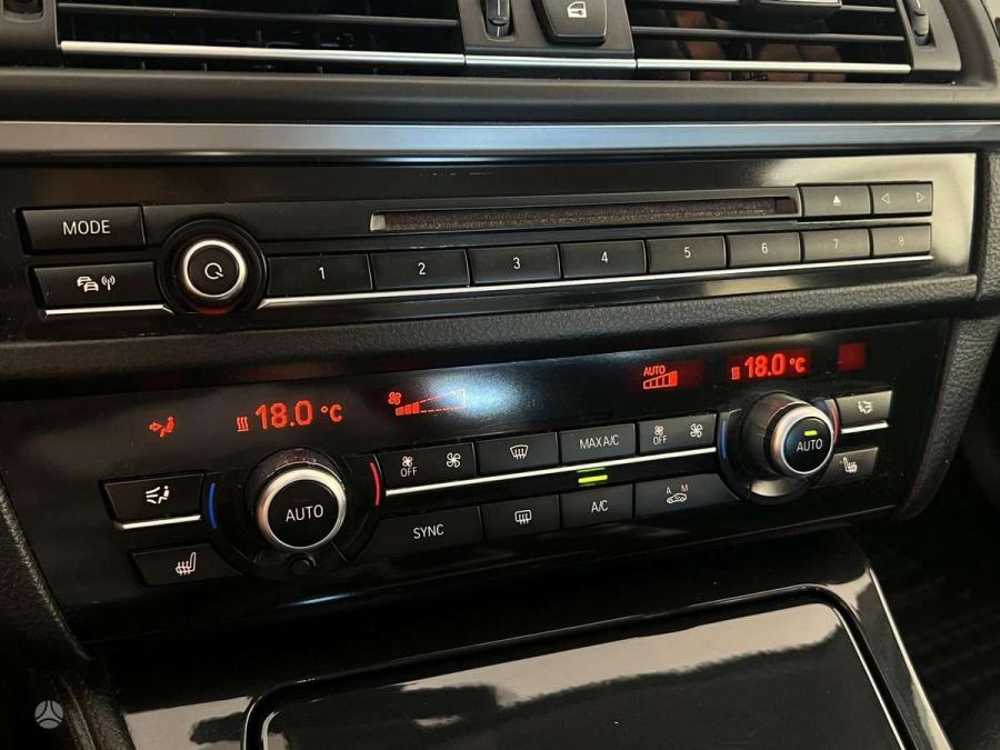 Black BMW 520 2013 in Kaunas, with an engine capacity of 2.00 L and mileage of 306 thousand km for 9999 €, photo 17 on AUTOMOTO.COM.LV
