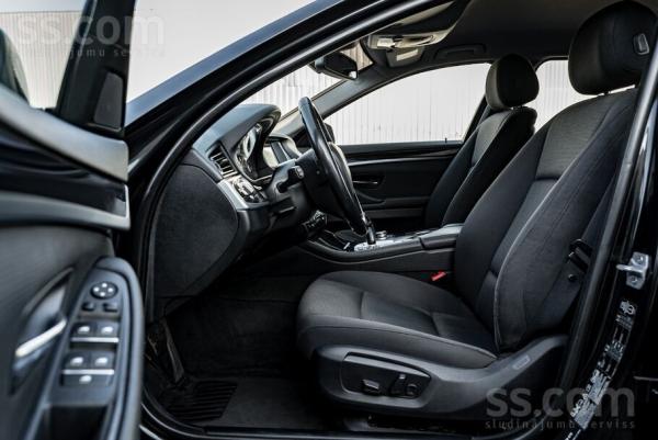 Black BMW 520 2014 in Riga, with an engine capacity of 2.00 L and mileage of 290 thousand km for 9750 €, photo 9 on AUTOMOTO.COM.LV