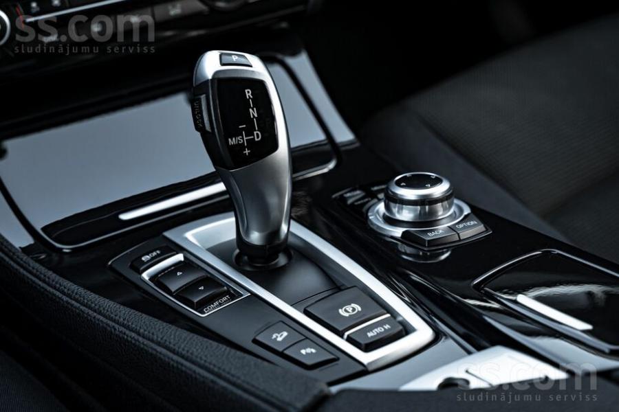 Black BMW 520 2014 in Riga, with an engine capacity of 2.00 L and mileage of 290 thousand km for 9750 €, photo 22 on AUTOMOTO.COM.LV