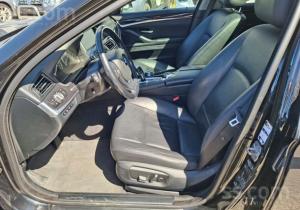 Black BMW 520 2014 in Riga, with an engine capacity of 2.00 L and mileage of 300 thousand km for 10700 €, photo 5 on AUTOMOTO.COM.LV