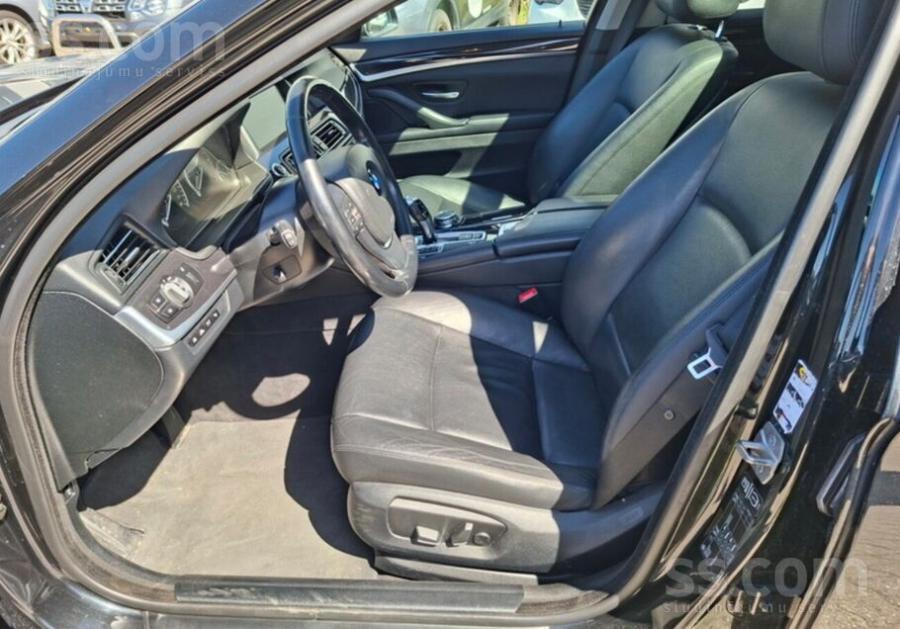 Black BMW 520 2014 in Riga, with an engine capacity of 2.00 L and mileage of 300 thousand km for 10700 €, photo 5 on AUTOMOTO.COM.LV