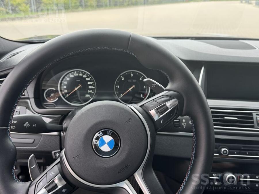 Black BMW 520 2014 in Riga, with an engine capacity of 2.00 L and mileage of 290 thousand km for 12800 €, photo 9 on AUTOMOTO.COM.LV