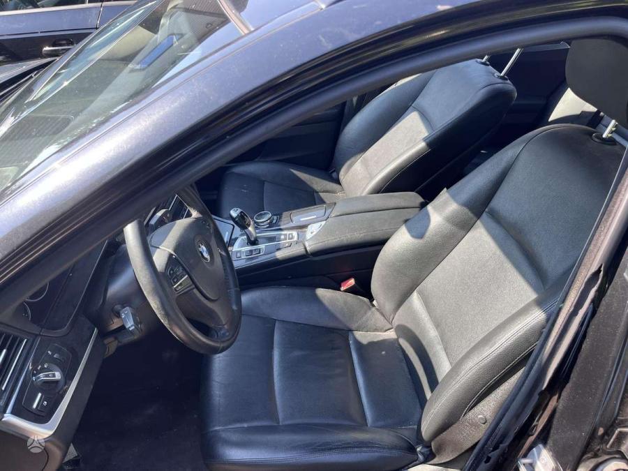 Black BMW 520 2014 in Kaunas, with an engine capacity of 2.00 L and mileage of 350 thousand km for 4450 €, photo 6 on AUTOMOTO.COM.LV