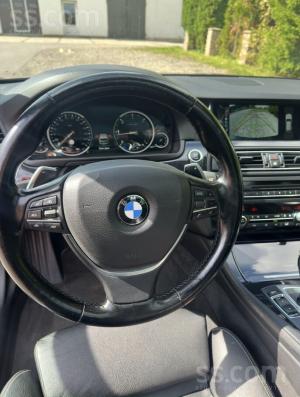 Black BMW 520 2014 in Riga, with an engine capacity of 2.00 L and mileage of 292 thousand km for 13700 €, photo 12 on AUTOMOTO.COM.LV