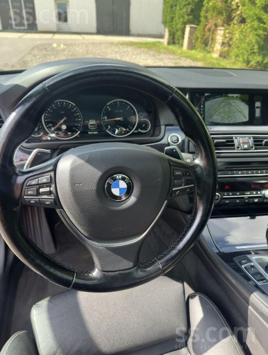 Black BMW 520 2014 in Riga, with an engine capacity of 2.00 L and mileage of 292 thousand km for 13700 €, photo 12 on AUTOMOTO.COM.LV