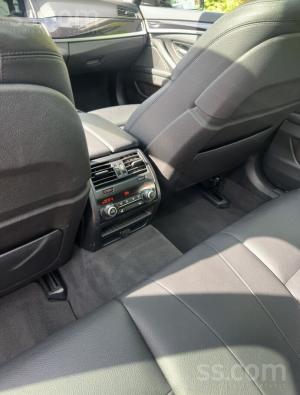 Black BMW 520 2014 in Riga, with an engine capacity of 2.00 L and mileage of 292 thousand km for 13700 €, photo 14 on AUTOMOTO.COM.LV