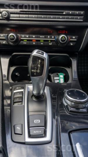 Black BMW 520 2014 in Riga, with an engine capacity of 2.00 L and mileage of 280 thousand km for 10190 €, photo 16 on AUTOMOTO.COM.LV