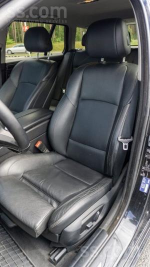 Black BMW 520 2014 in Riga, with an engine capacity of 2.00 L and mileage of 280 thousand km for 10190 €, photo 29 on AUTOMOTO.COM.LV