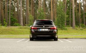 Black BMW 520 2016 in Riga, with an engine capacity of 2.00 L and mileage of 268 thousand km for 10590 €, photo 7 on AUTOMOTO.COM.LV