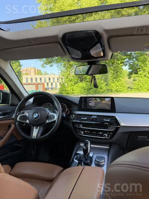Black BMW 520 2017 in Riga, with an engine capacity of 2.00 L and mileage of 219 thousand km for 18700 €, photo 7 on AUTOMOTO.COM.LV