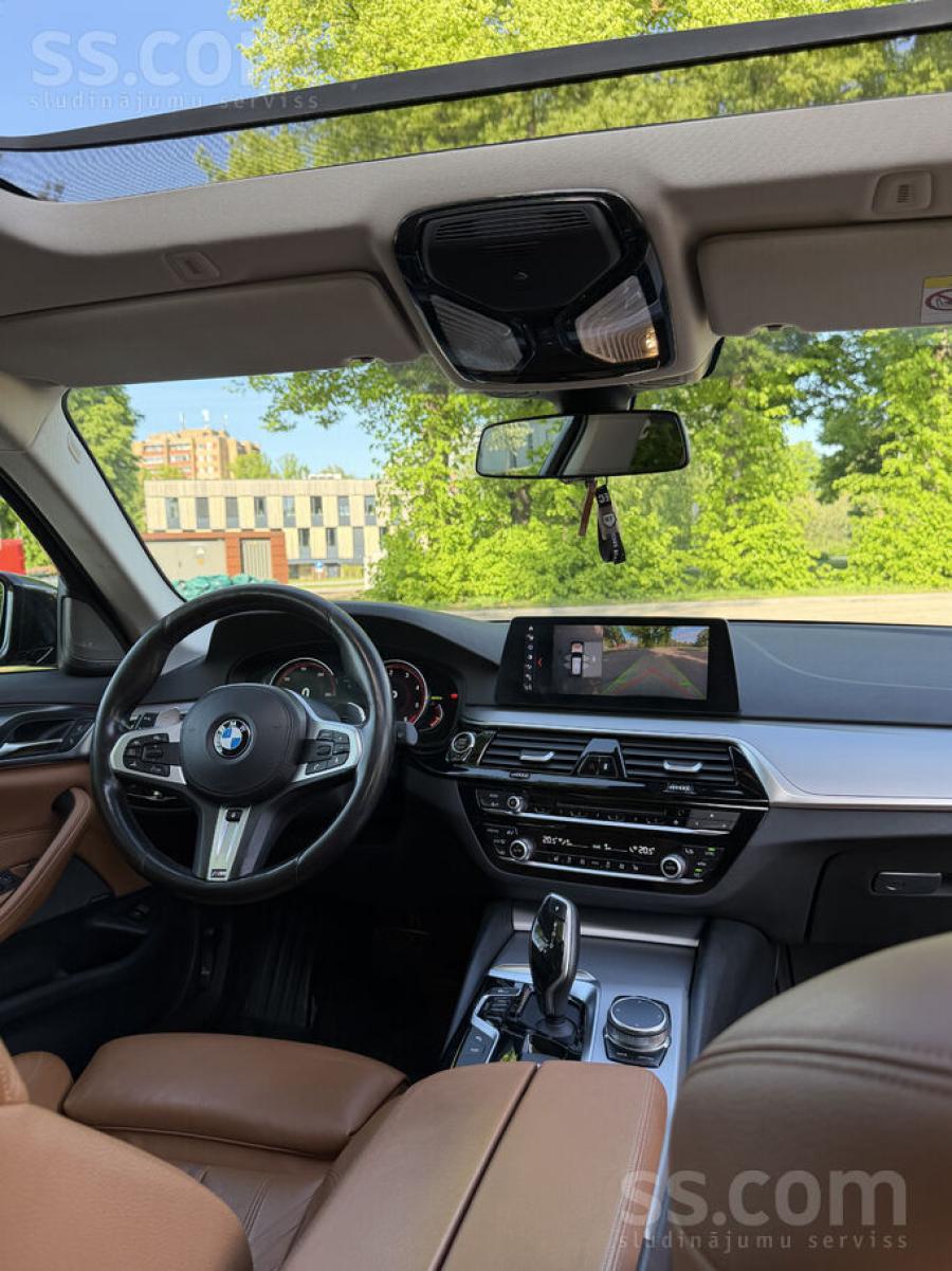 Black BMW 520 2017 in Riga, with an engine capacity of 2.00 L and mileage of 219 thousand km for 18700 €, photo 7 on AUTOMOTO.COM.LV