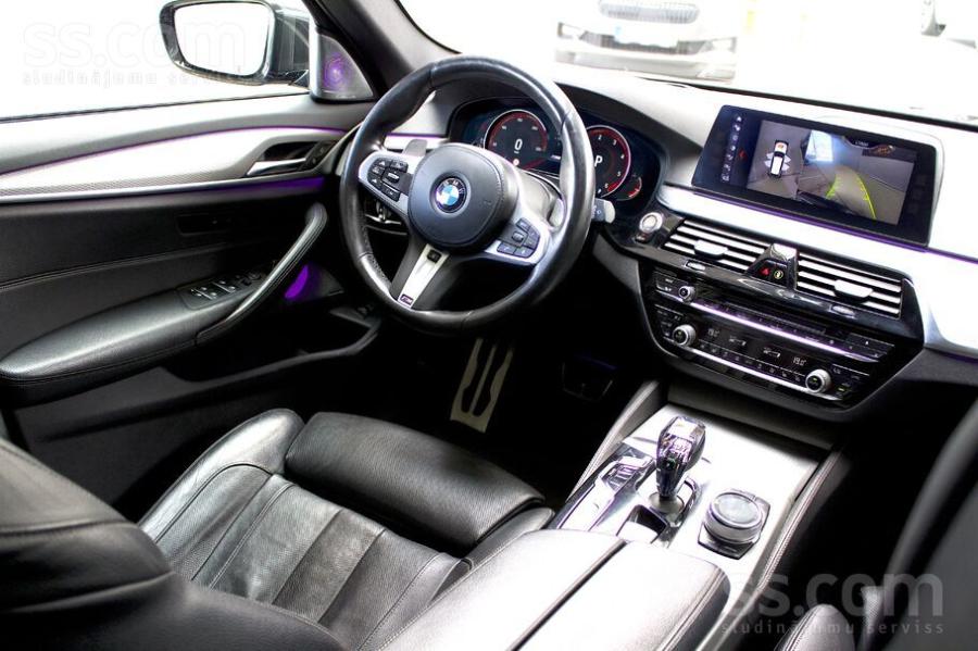 Black BMW 520 2017 in Riga, with an engine capacity of 2.00 L and mileage of 284 thousand km for 18900 €, photo 6 on AUTOMOTO.COM.LV