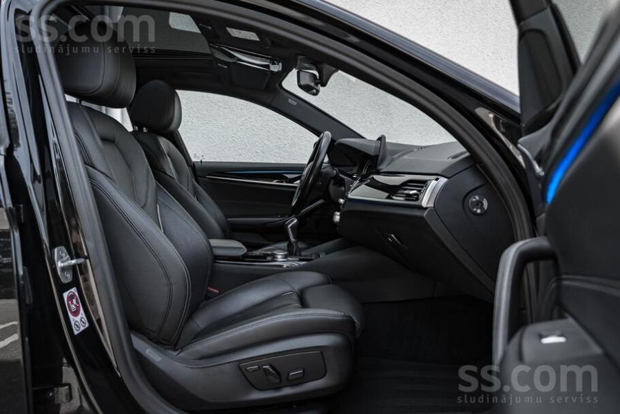 Black BMW 520 2017 in Riga, with an engine capacity of 2.00 L and mileage of 269 thousand km for 14995 €, photo 11 on AUTOMOTO.COM.LV
