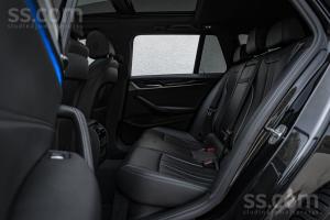 Black BMW 520 2017 in Riga, with an engine capacity of 2.00 L and mileage of 269 thousand km for 14995 €, photo 12 on AUTOMOTO.COM.LV