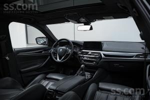 Black BMW 520 2017 in Riga, with an engine capacity of 2.00 L and mileage of 269 thousand km for 14995 €, photo 15 on AUTOMOTO.COM.LV