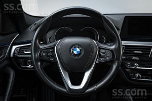 Black BMW 520 2017 in Riga, with an engine capacity of 2.00 L and mileage of 269 thousand km for 14995 €, photo 18 on AUTOMOTO.COM.LV