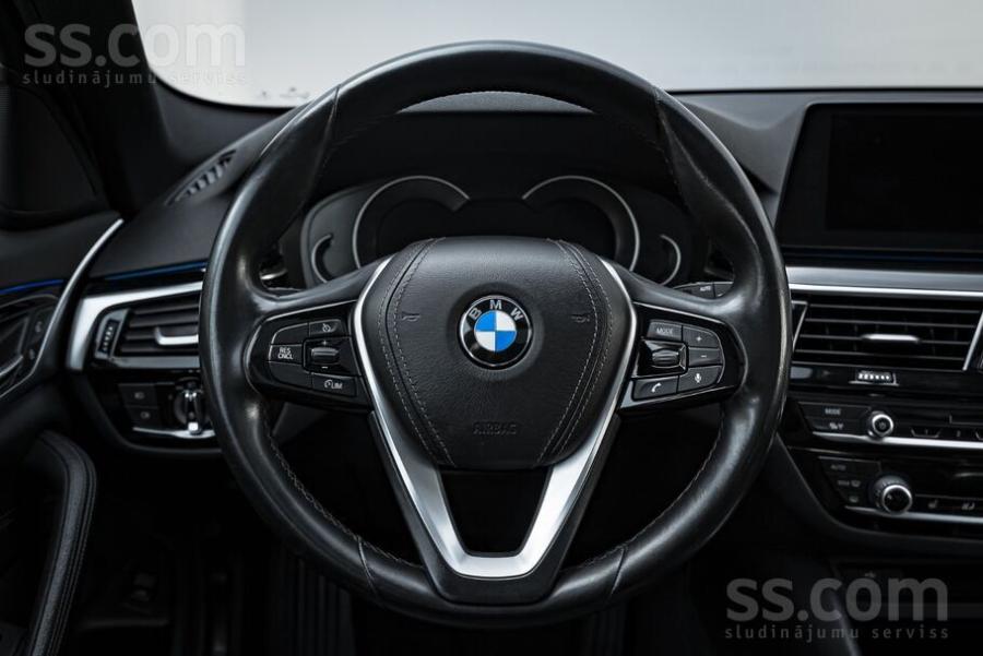 Black BMW 520 2017 in Riga, with an engine capacity of 2.00 L and mileage of 269 thousand km for 14995 €, photo 18 on AUTOMOTO.COM.LV