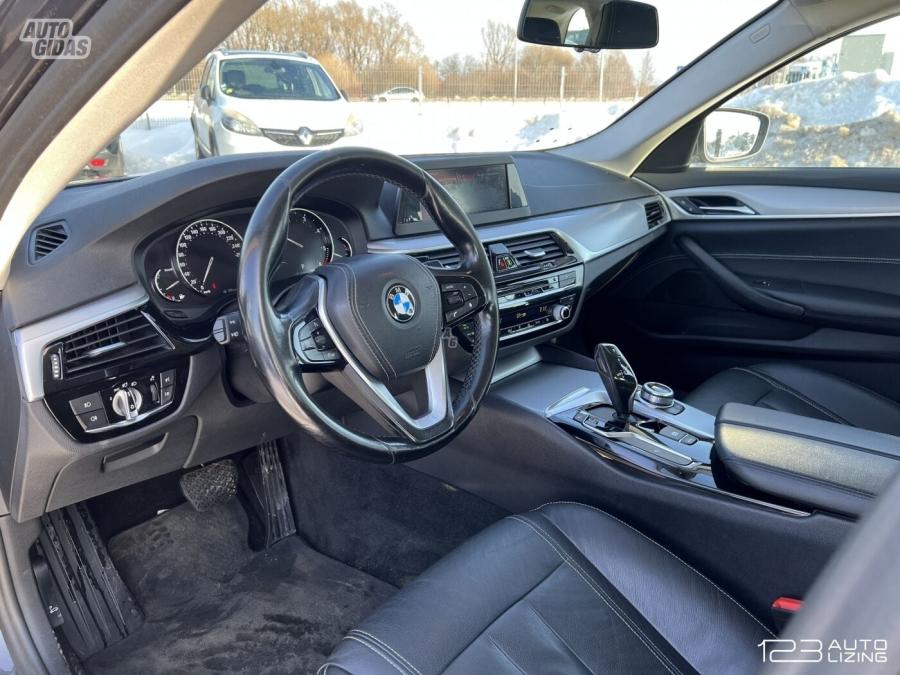 Black BMW 520 2018 in Taurage, with an engine capacity of 2.00 L and mileage of 242 thousand km for 13999 €, photo 11 on AUTOMOTO.COM.LV
