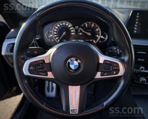 Black BMW 520 2018 in Riga, with an engine capacity of 2.00 L and mileage of 252 thousand km for 16450 €, photo 12 on AUTOMOTO.COM.LV