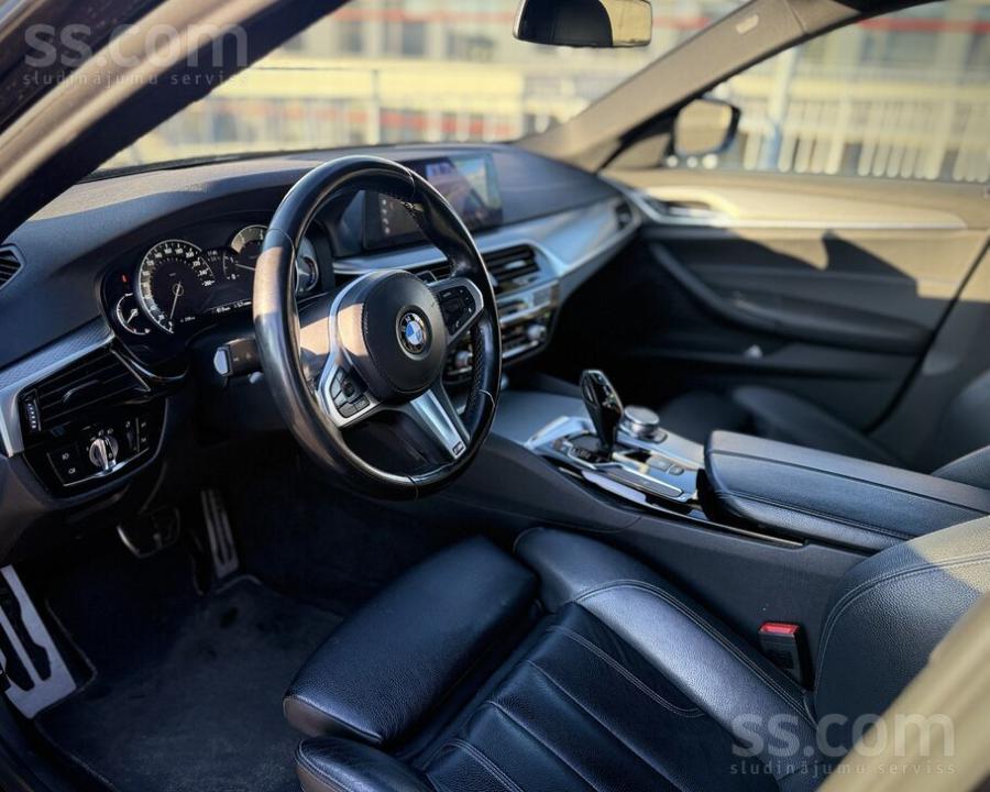 Black BMW 520 2018 in Riga, with an engine capacity of 2.00 L and mileage of 252 thousand km for 16450 €, photo 14 on AUTOMOTO.COM.LV